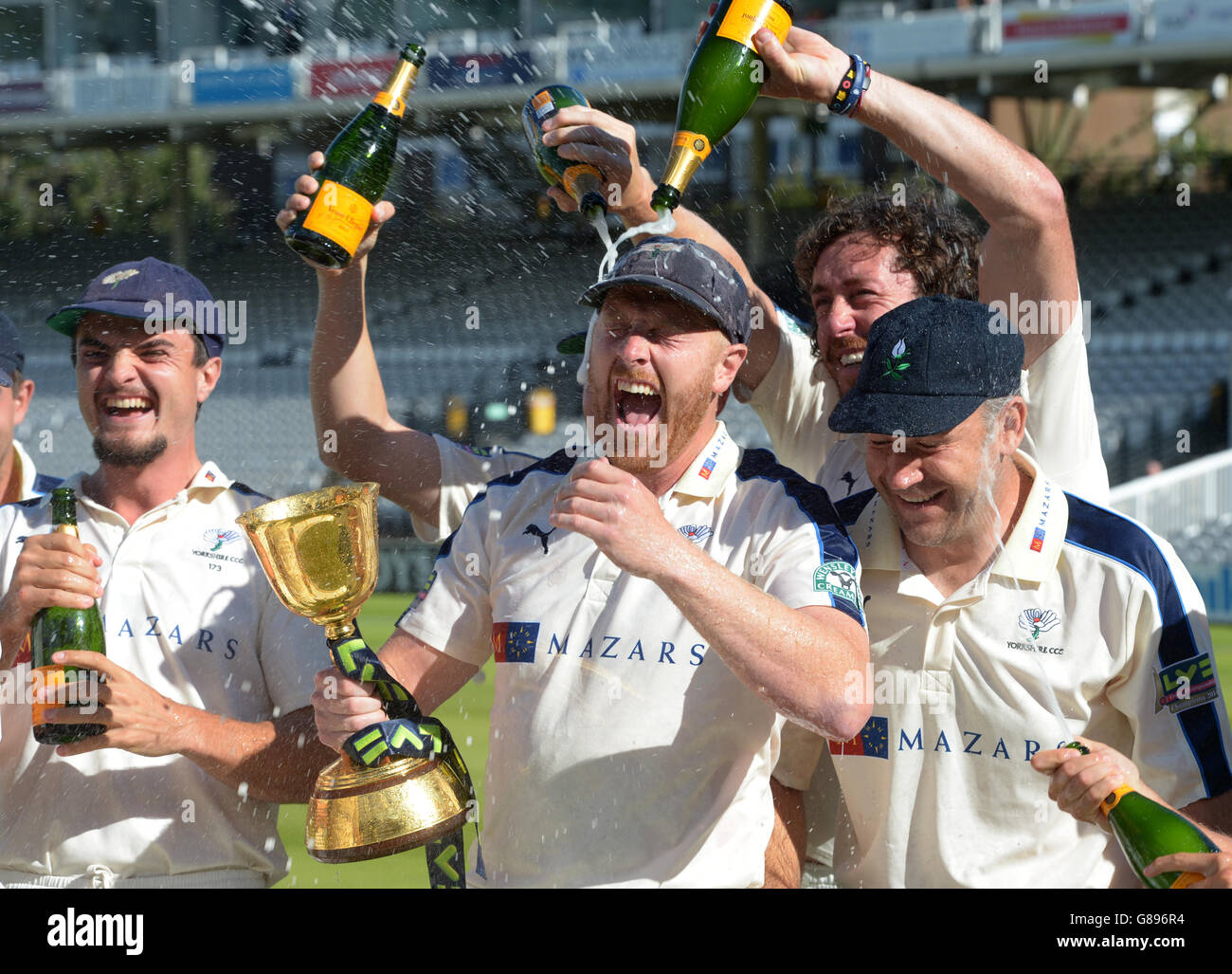 Yorkshire captain Andrew Gale lifts the County Championship trophy ...