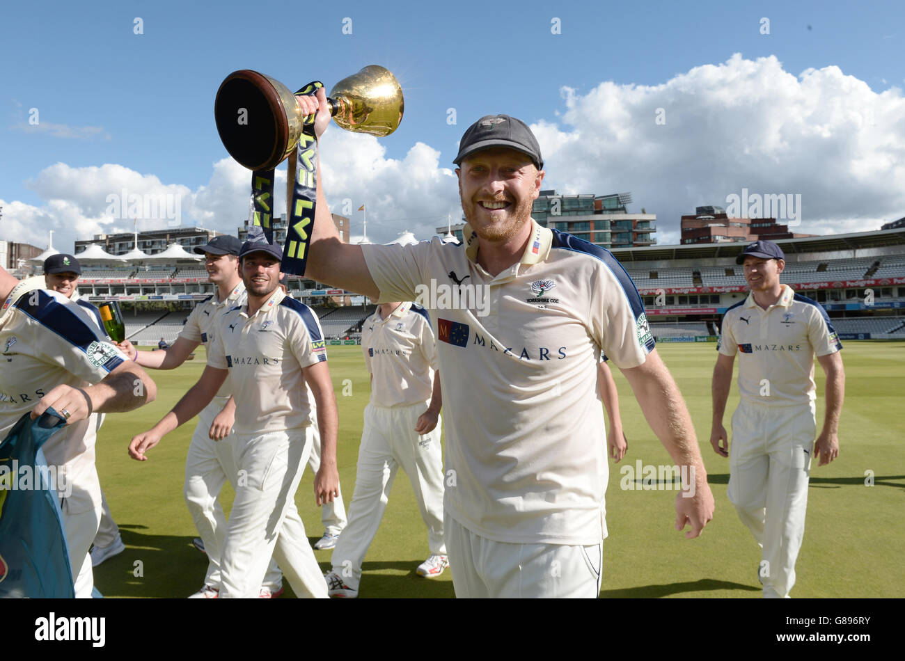 Yorkshire captain Andrew Gale lifts the County Championship trophy ...