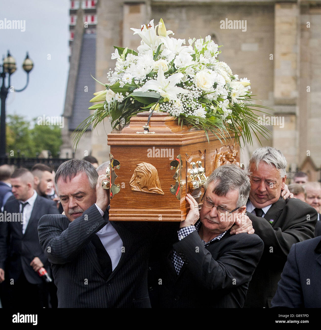 The coffin of Kevin McKee is carried by (left-right) Kieran & Sean ...
