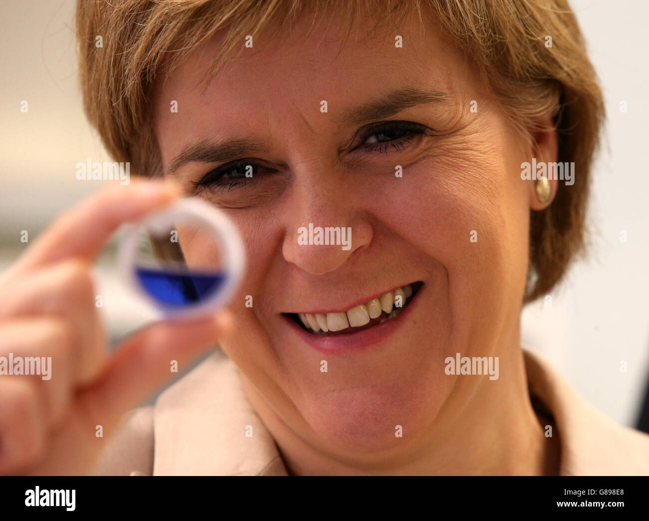 First Minister Nicola Sturgeon looks through a petri dish at Clyde ...