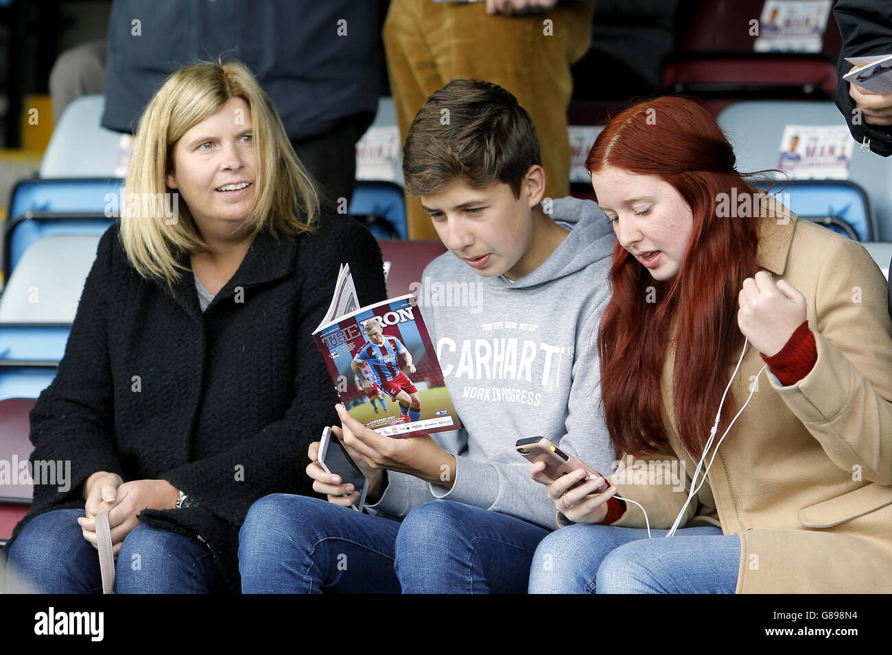 Scunthorpe United fans in the stands at Glanford Park Stock Photo - Alamy