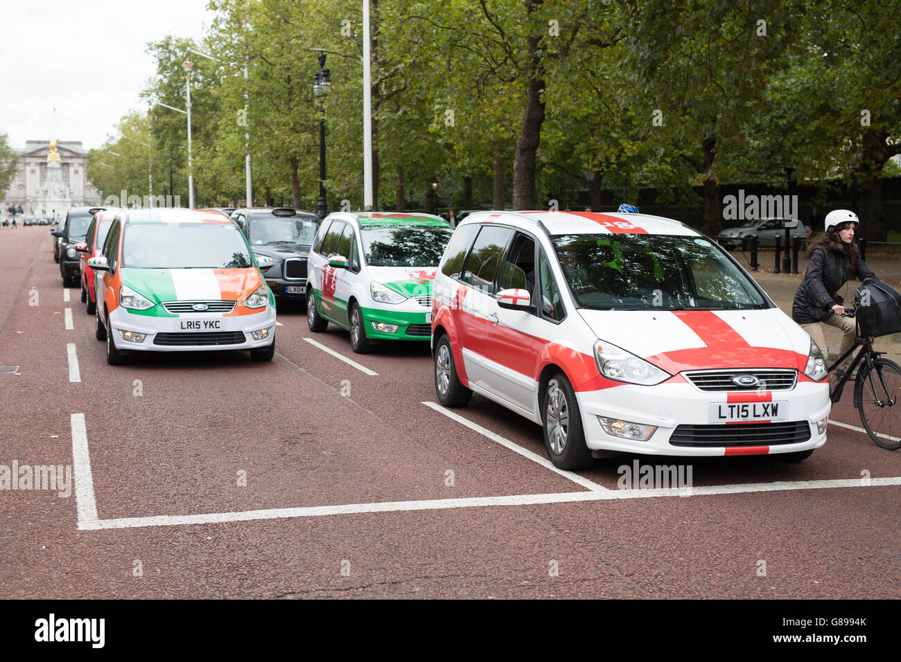 20 Addison Lee cars drive down The Mall in London to launch their # ...