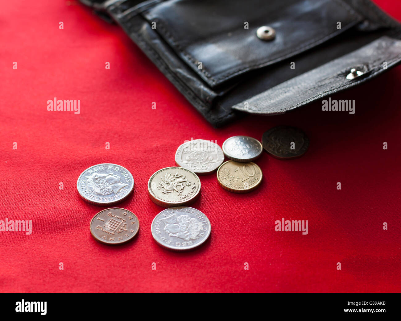 Spilled coins hi-res stock photography and images - Alamy