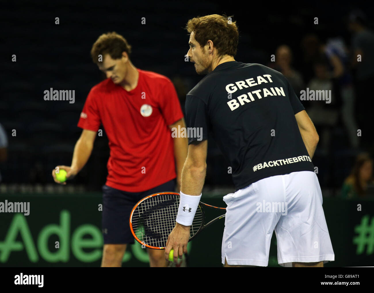 Great Britain's Andy Murray and brother Jamie (left) warm up before ...