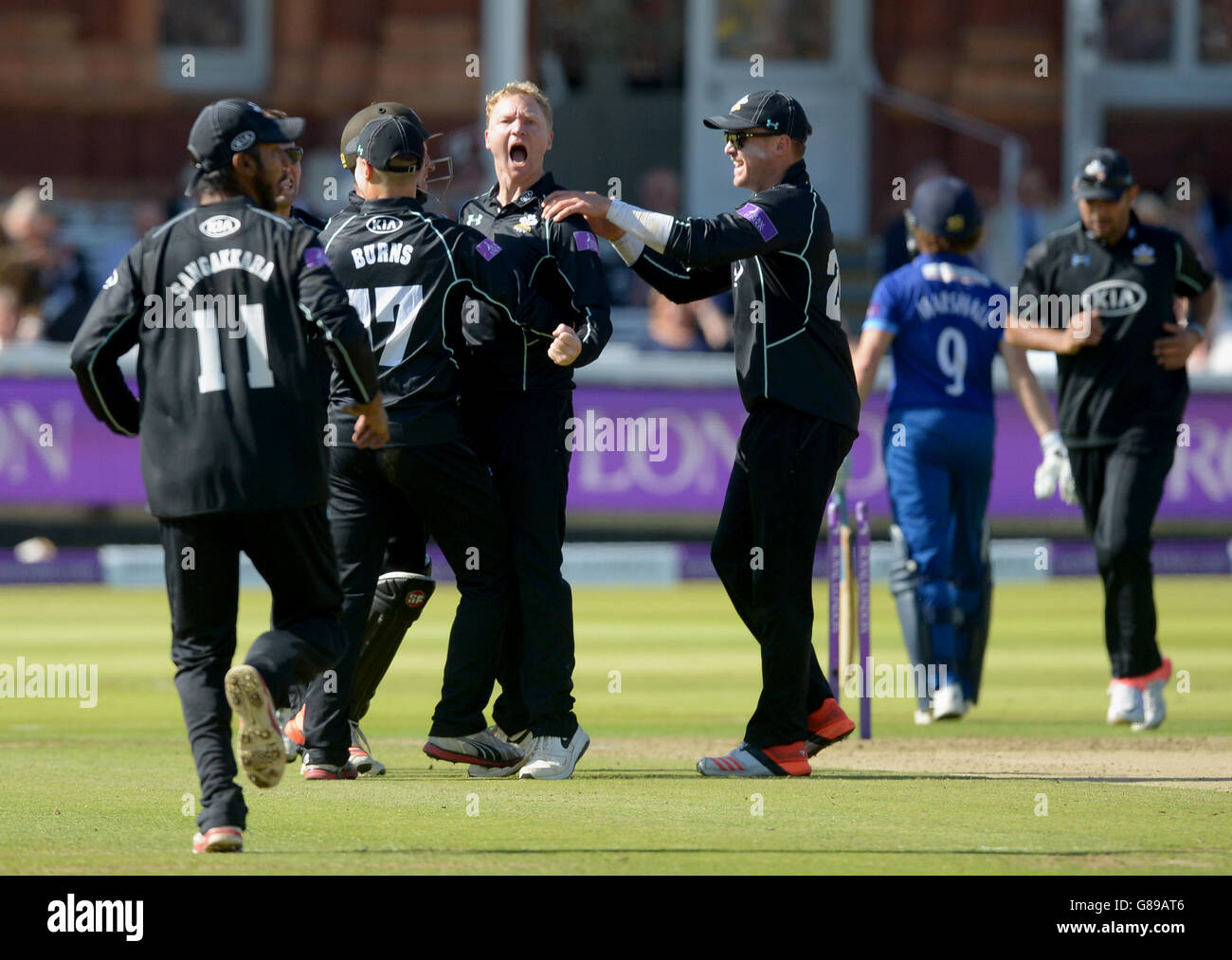 Surrey captain Gareth Batty celebrates taking the wicket of ...