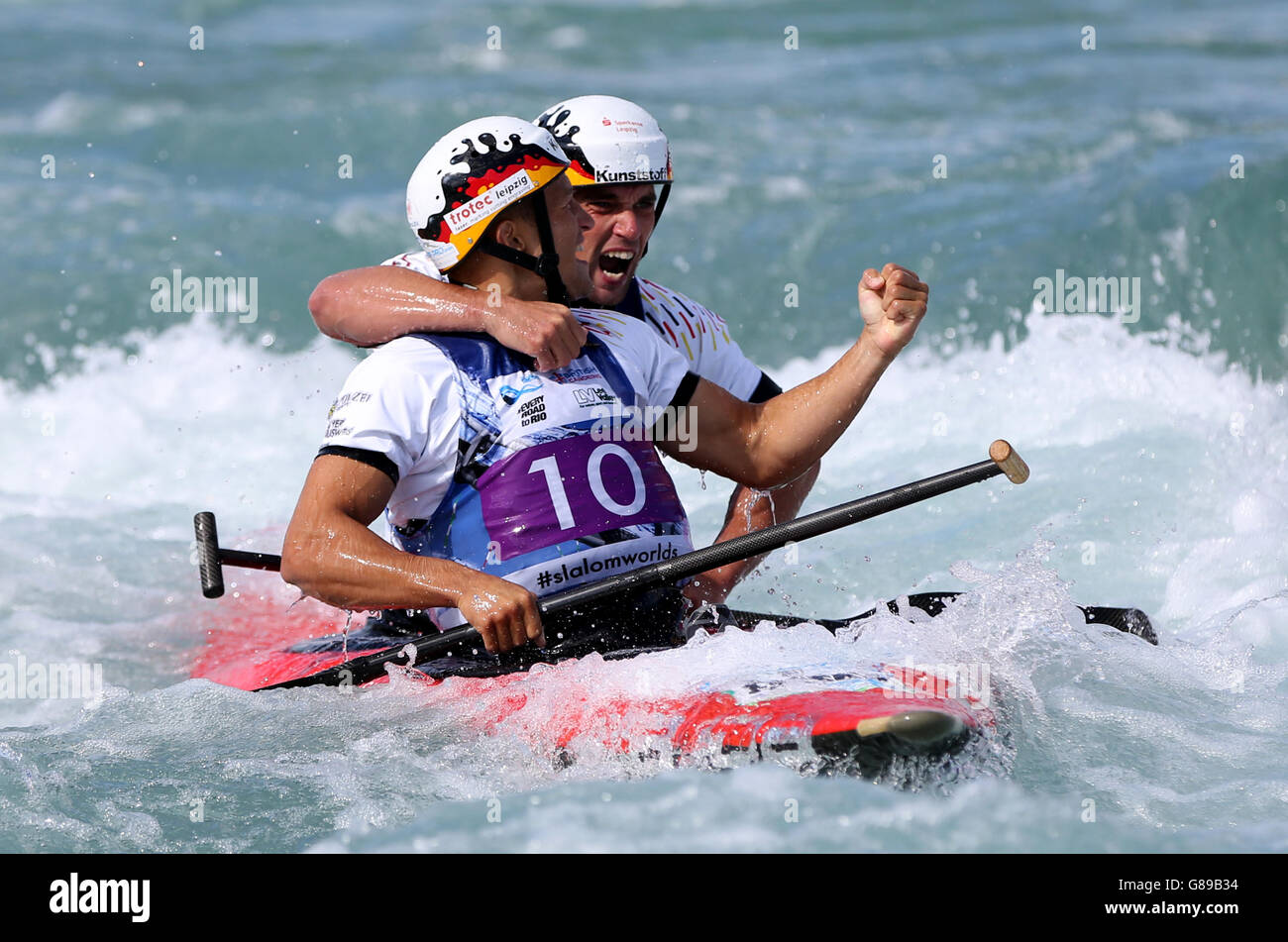 Germany's Franz Anton and Jan Benzien celebrate winning the gold medal ...