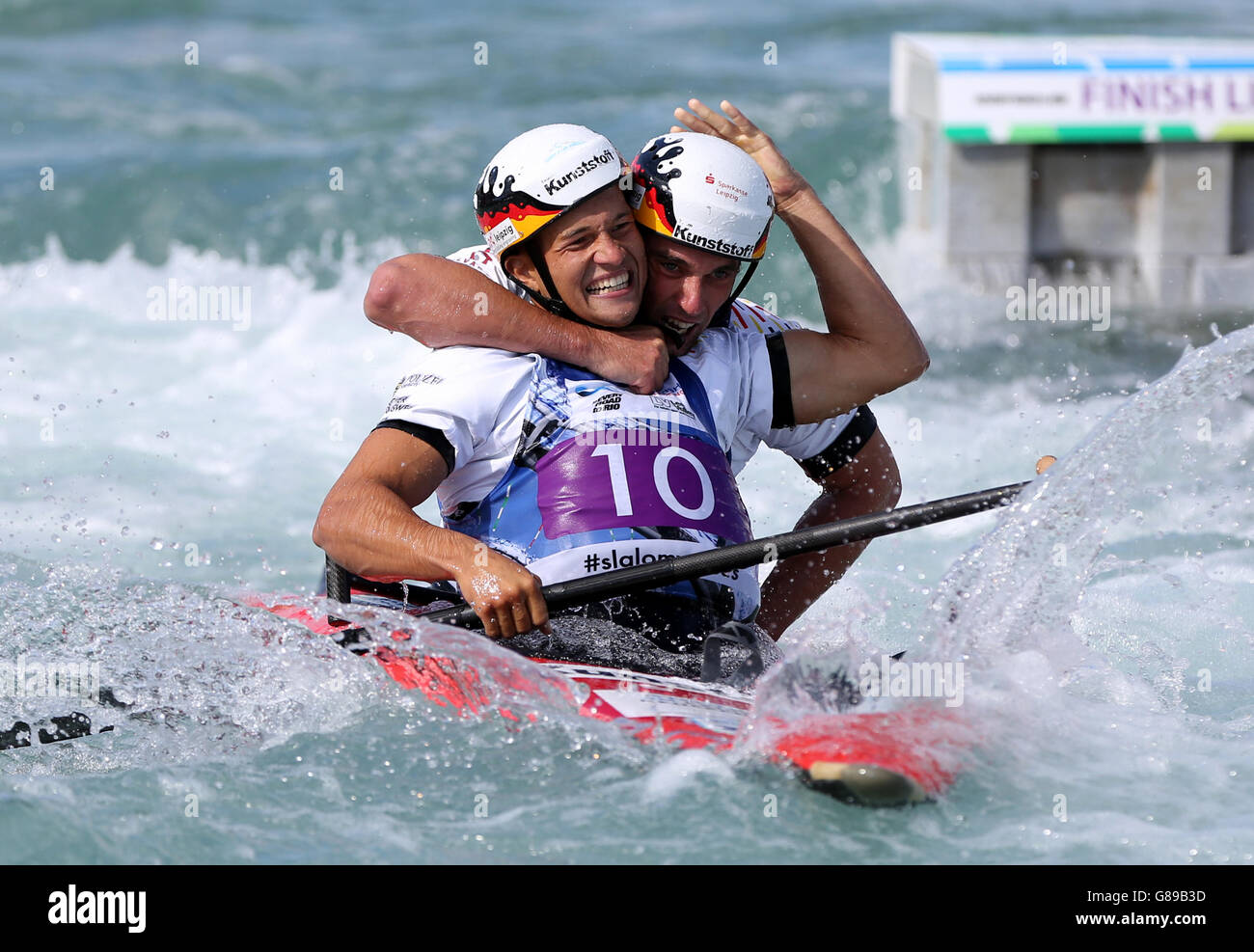 Germany's Franz Anton and Jan Benzien celebrate winning the gold medal ...