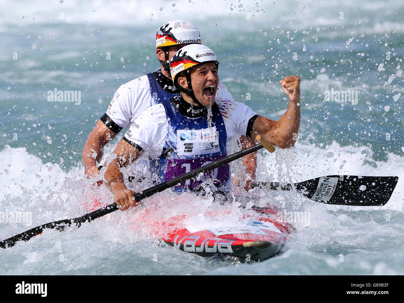 Germany's Franz Anton and Jan Benzien celebrate winning the gold medal ...