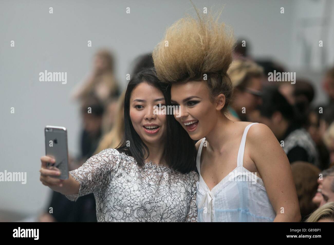 Singer Tallia Storm (right) has her picture taken at the Bora Aksu ...