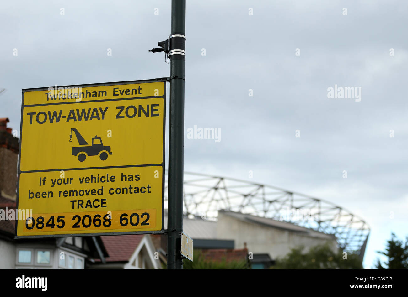 A traffic enforcement sign warning vehicle owners they are in a tow ...