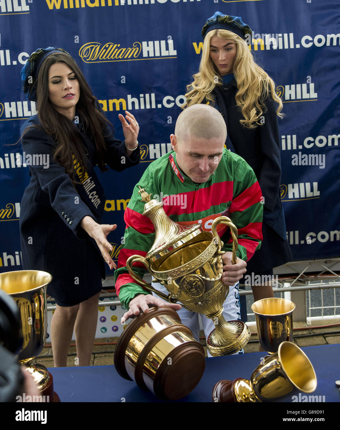 Tony Hamilton drops the trophy as he celebrates winning the William ...