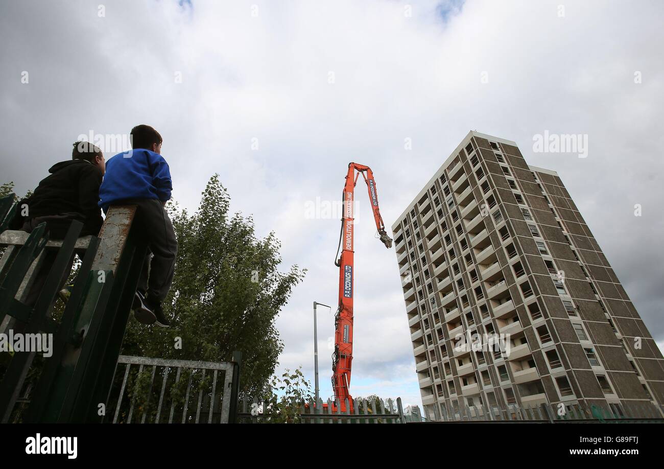 Two boys look on as the demolition of the Joseph Plunkett Tower in ...