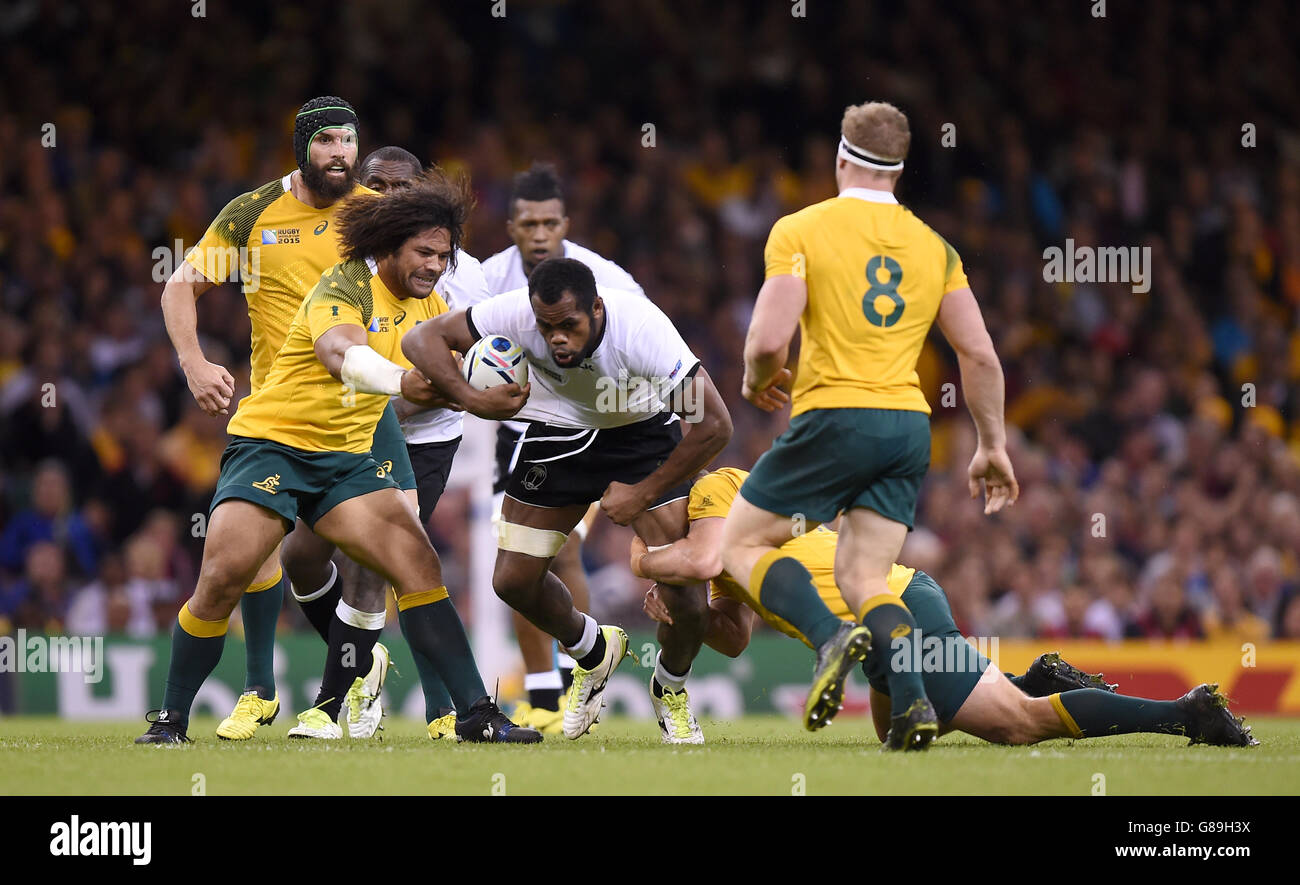 Fiji's Peceli Yato is tackled by Australia's Tatafu Polota-Nau (left ...