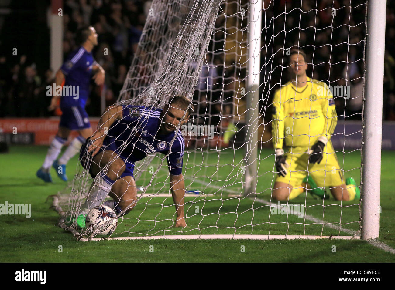 Chelsea goalkeeper Asmir Begovic and teammate Branislav Ivanovic (left ...