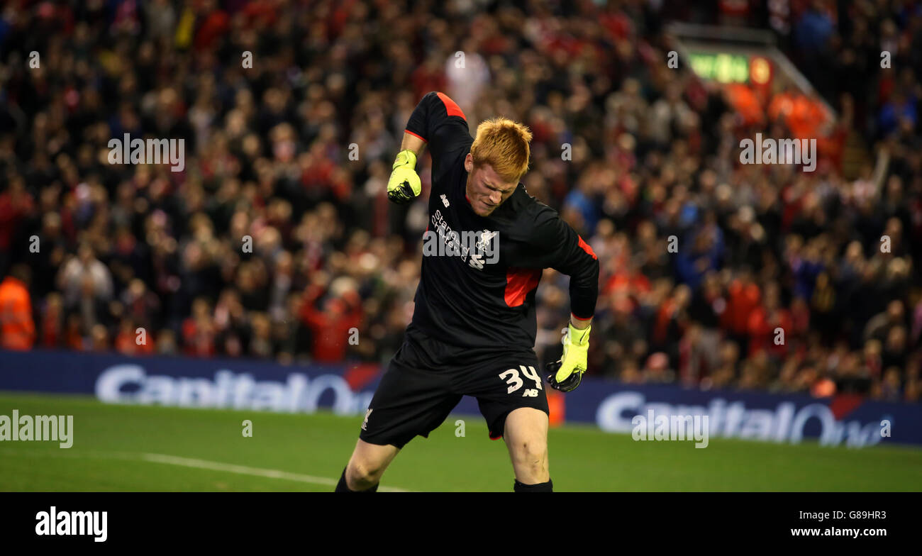 Liverpool goalkeeper Adam Bogdan celebrates saving a penalty in the ...