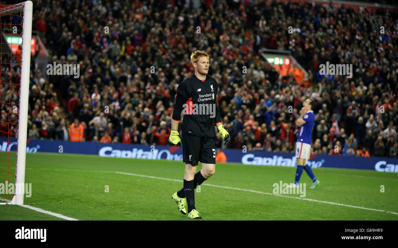 Liverpool goalkeeper Adam Bogdan reacts after saving Luke Joyce's ...