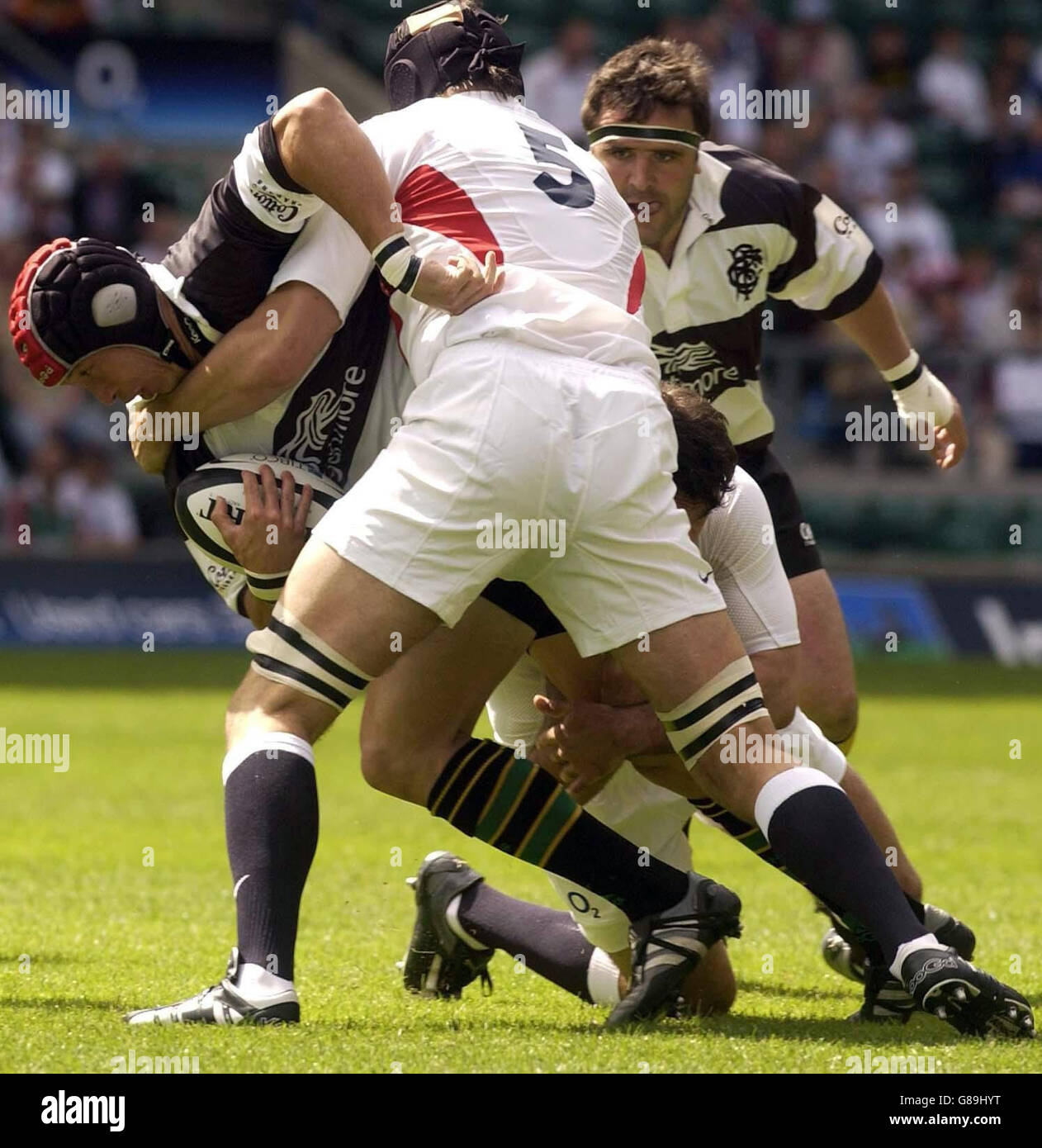 Barbarians bruce reihana l is stopped by englands tom palmer hi-res ...