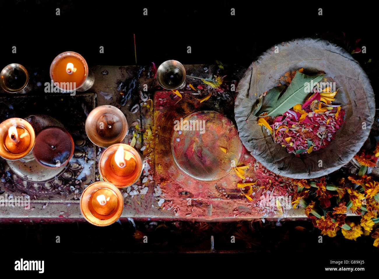 A Ritual offering at Rato Machhendranath Temple the patron god of Patan ...
