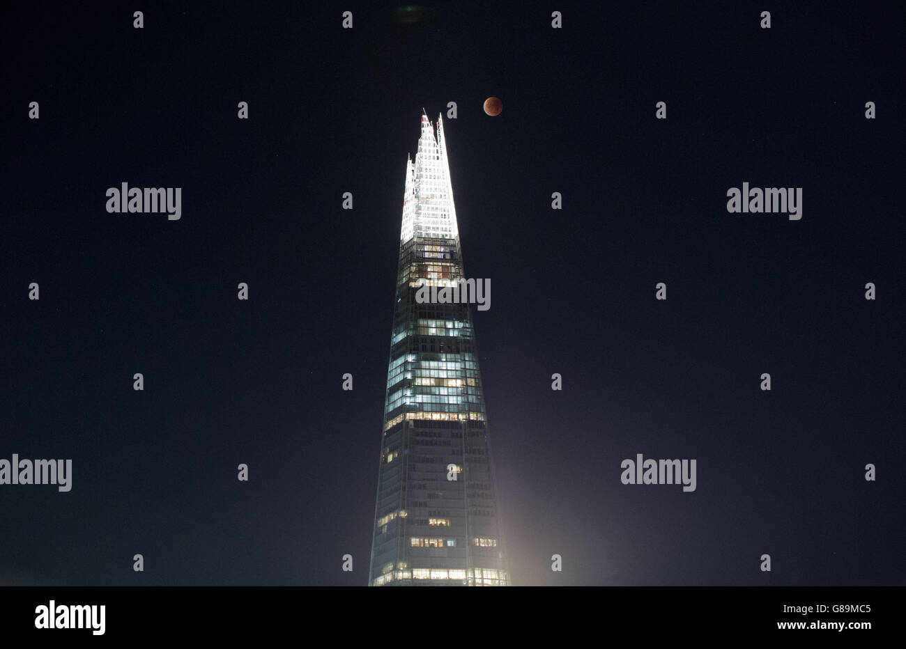A blood red supermoon in the skies above the shard hi-res stock ...