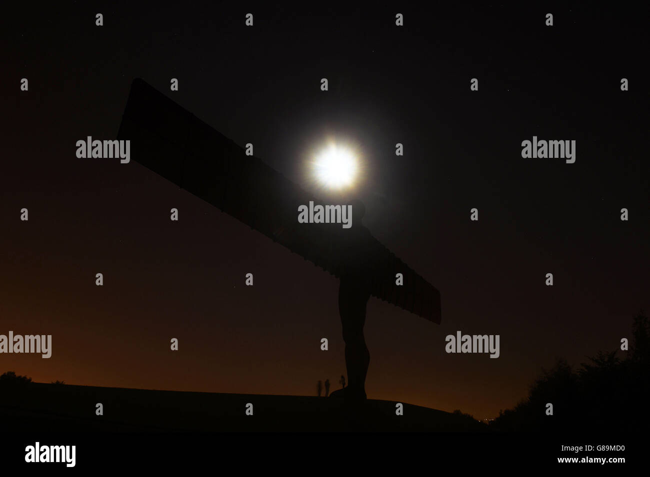 A blood red "supermoon" in the skies above the Angel of the North ...