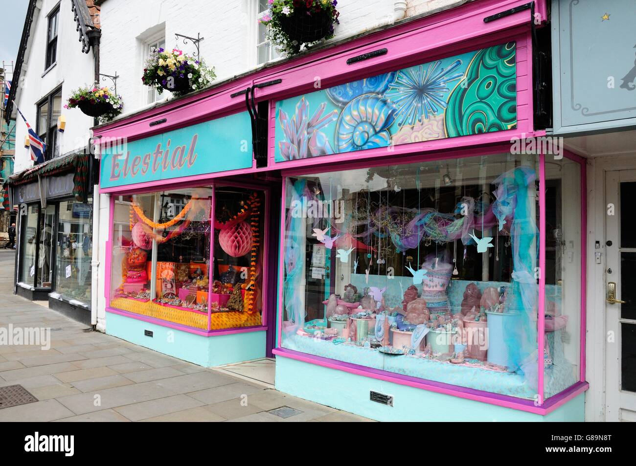 Pink and blue shop front Glastonbury Somerset England Stock Photo - Alamy