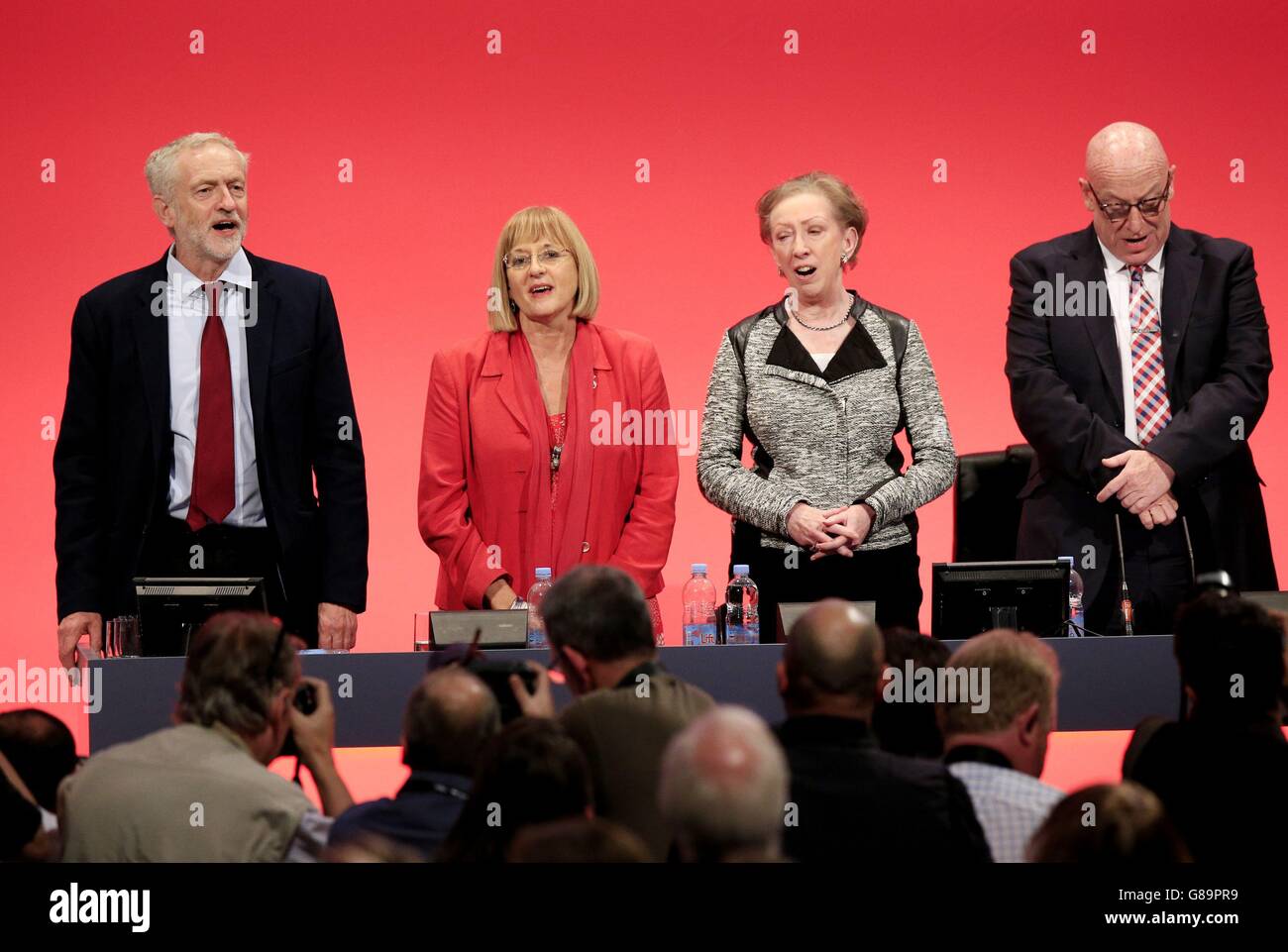 Labour leader Jeremy Corbyn sings 'The Red Flag' alongside (left to ...