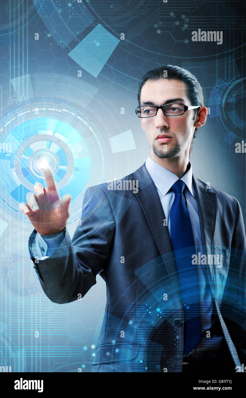 Businessman pressing virtual buttons in futuristic concept Stock Photo ...