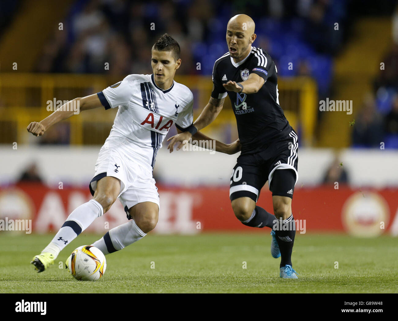 Tottenham Hotspur's Erik Lamela (left) and Qarabag's Richard Almeida ...