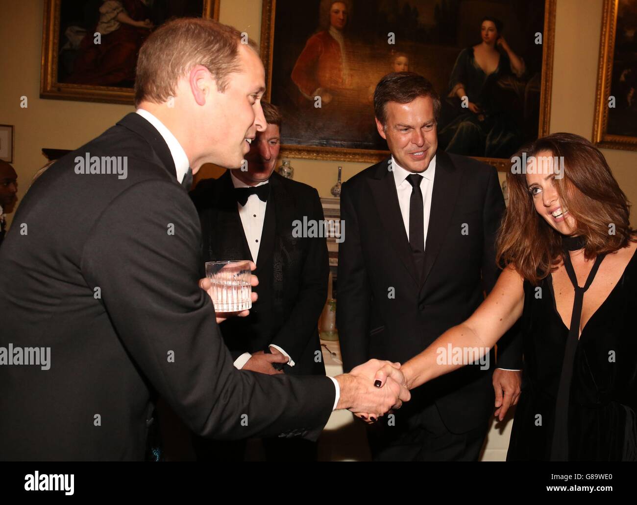 The Duke of Cambridge talks to guests including Peter Jones and wife ...