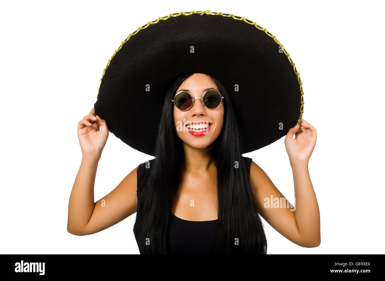 Young mexican woman wearing sombrero isolated on white Stock Photo - Alamy