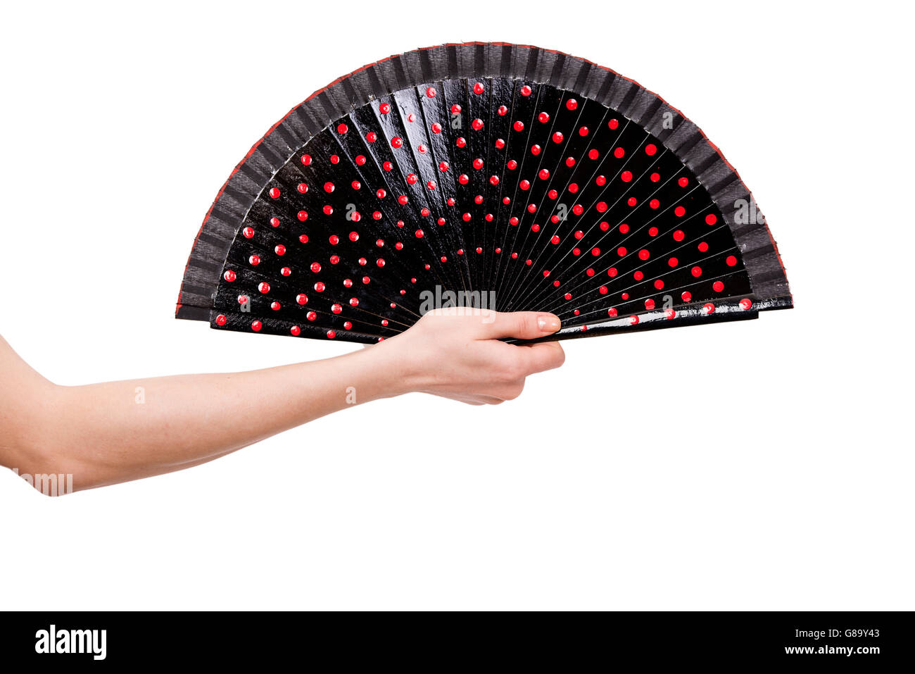 Hand holding fan isolated on white background Stock Photo - Alamy