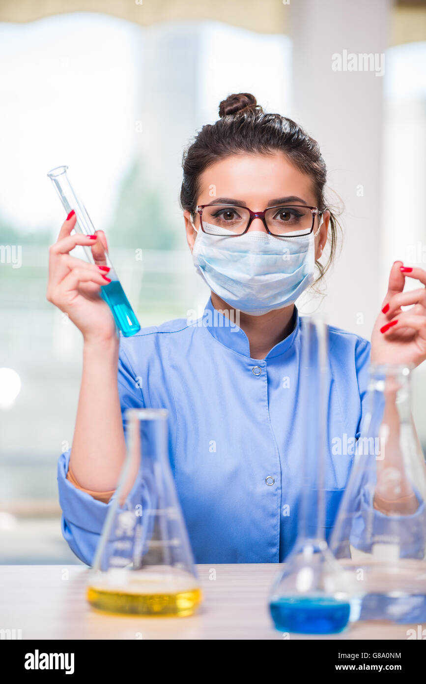Woman doctor doing chemical tests in laboratory Stock Photo - Alamy