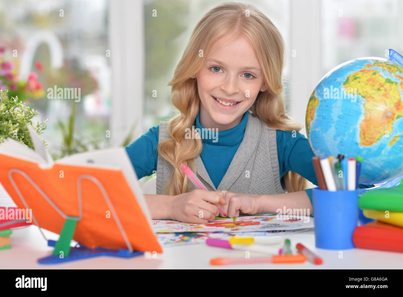 Cute student girl at class Stock Photo - Alamy
