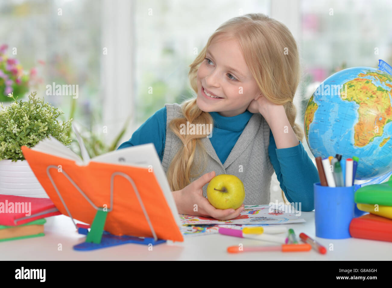 Cute student girl at class Stock Photo - Alamy