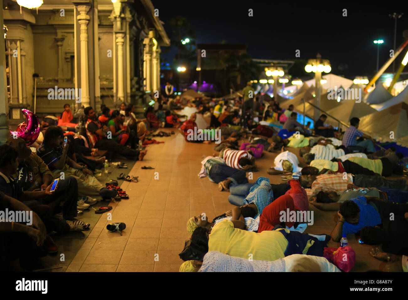 Hindu devotees sleeping on the Batu Cave temple floor, Kuala Lumpur ...