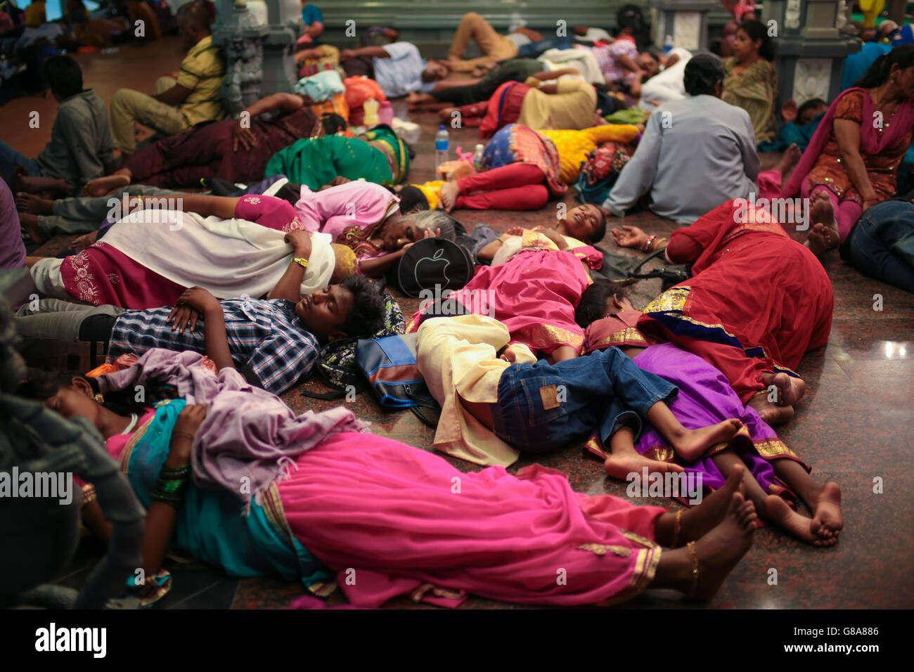 Hindu devotees sleeping on the Batu Cave temple floor, Kuala Lumpur ...