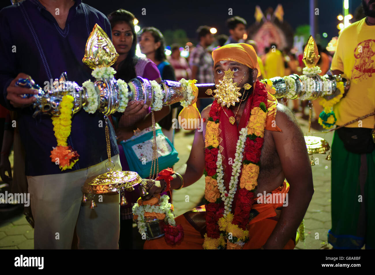 Hindu kavadi bearer carry heavy rod and his companions at Batu Cave ...