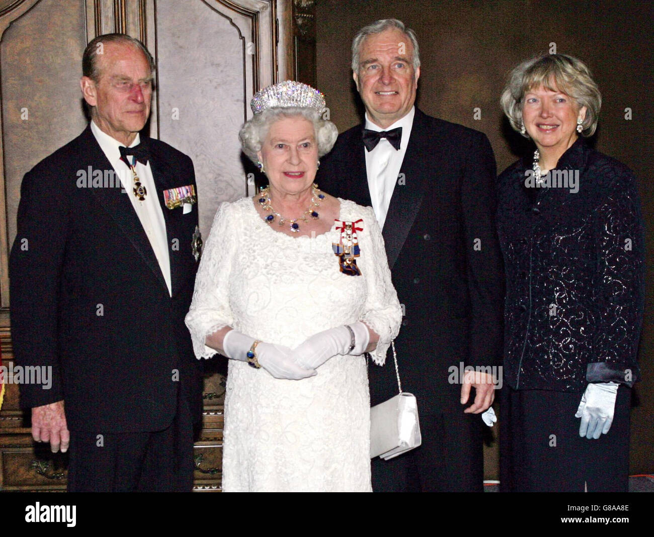 Queen Elizabeth II and the Duke of Edinburgh stand with the Canadian ...