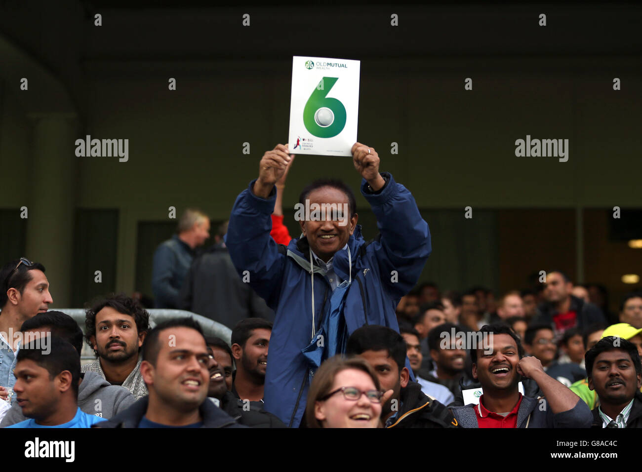 Cricket six placard hi-res stock photography and images - Alamy