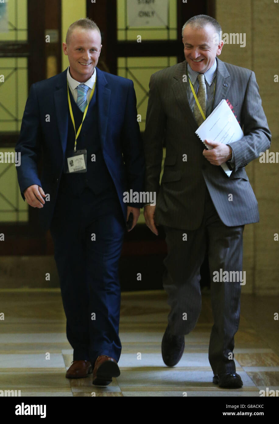 Jamie Bryson (left) and Pastor Mark Gordon leaving Parliament Buildings ...