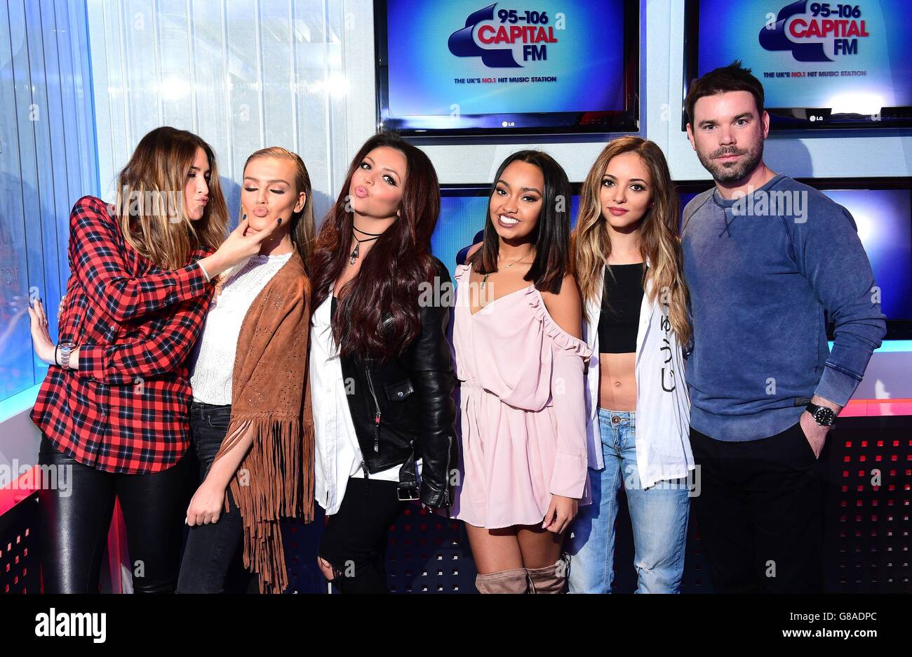 Presenters Lisa Snowdon (left and Dave Berry with Little Mix (left to ...