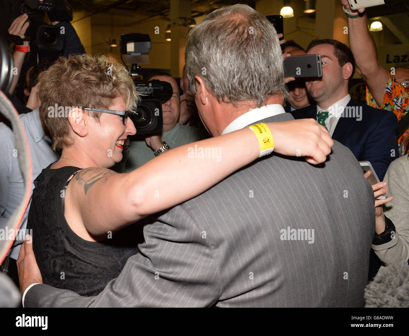 Ukip party supporter Kerrie Webb hugs Nigel Farage after he autographed ...