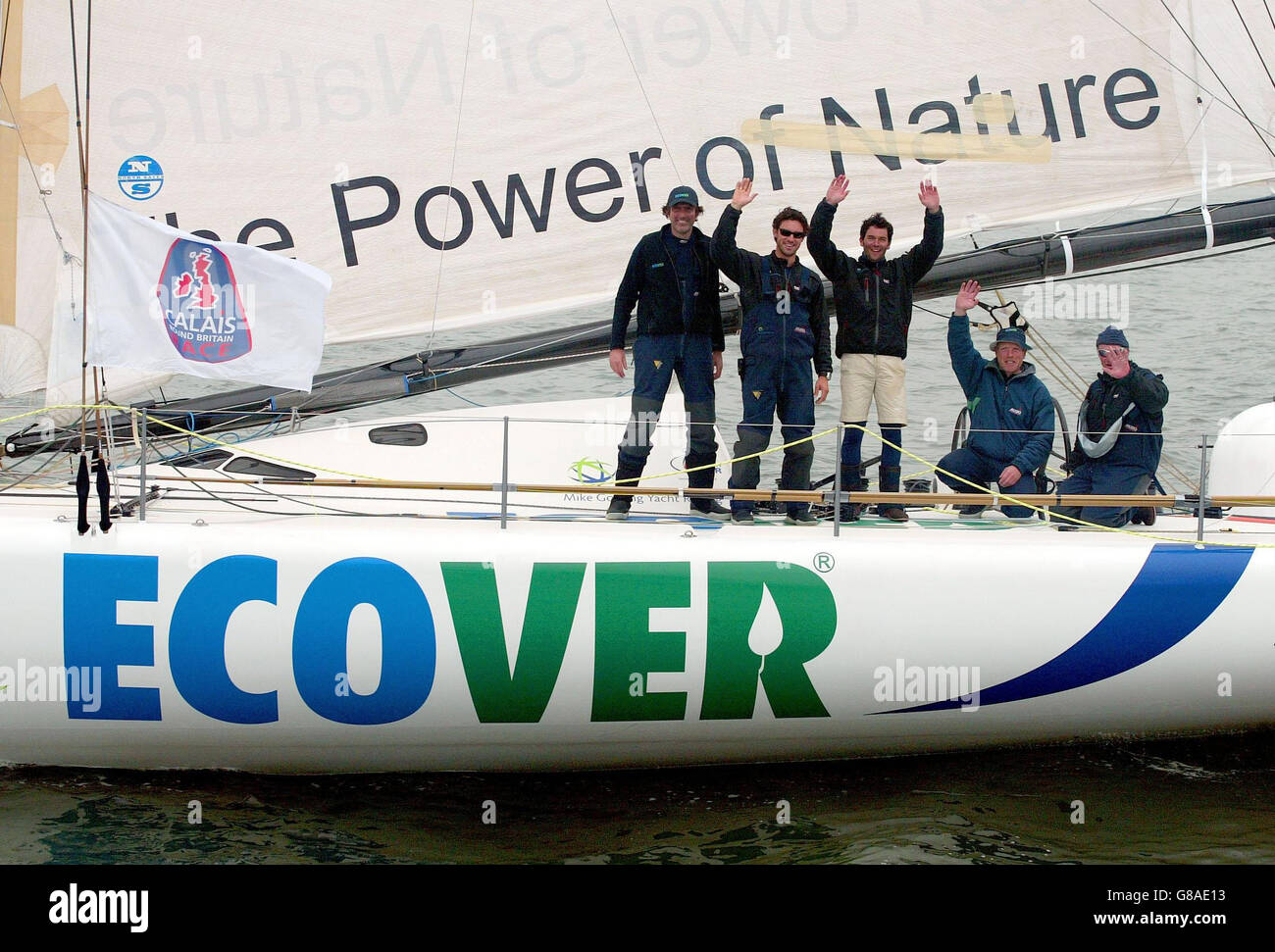Mike Golding's crew aboard ECOVER celebrate coming second in the Calais ...