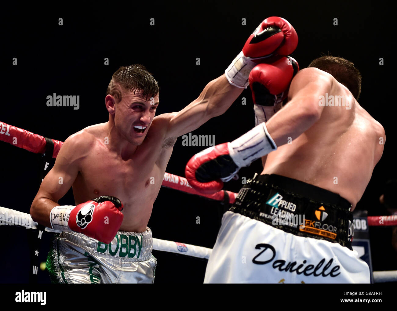 Bobby Jenkinson (left) on his way to defeating Lewis Pettitt (right) in ...