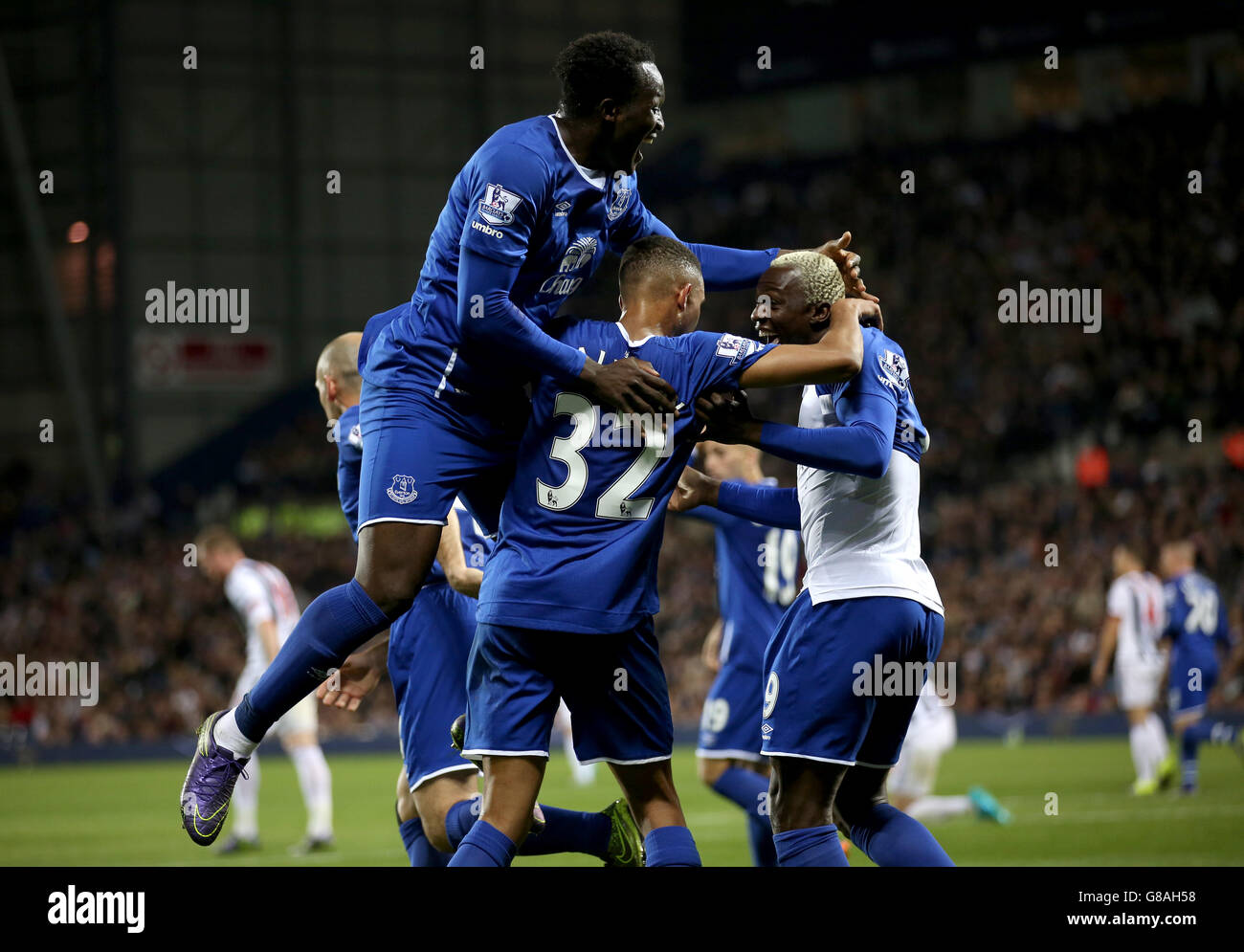 Everton's Arouna Kone (right) celebrates scoring his side's second goal ...