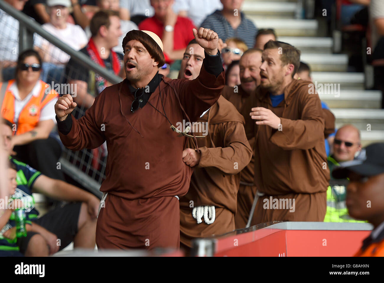Fans in stands dressed as monks hi-res stock photography and images - Alamy