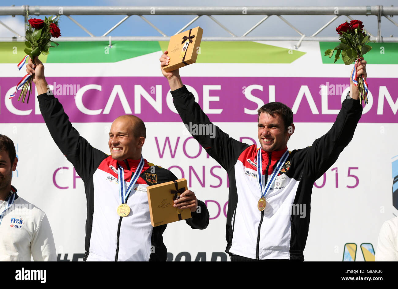 Germany's Franz Anton and Jan Benzien celebrate winning the gold medal ...