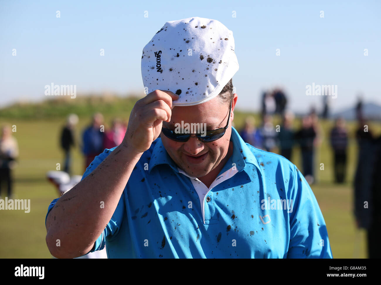 Scotland's Chris Doak after playing a shot out of the Swilken Burn ...