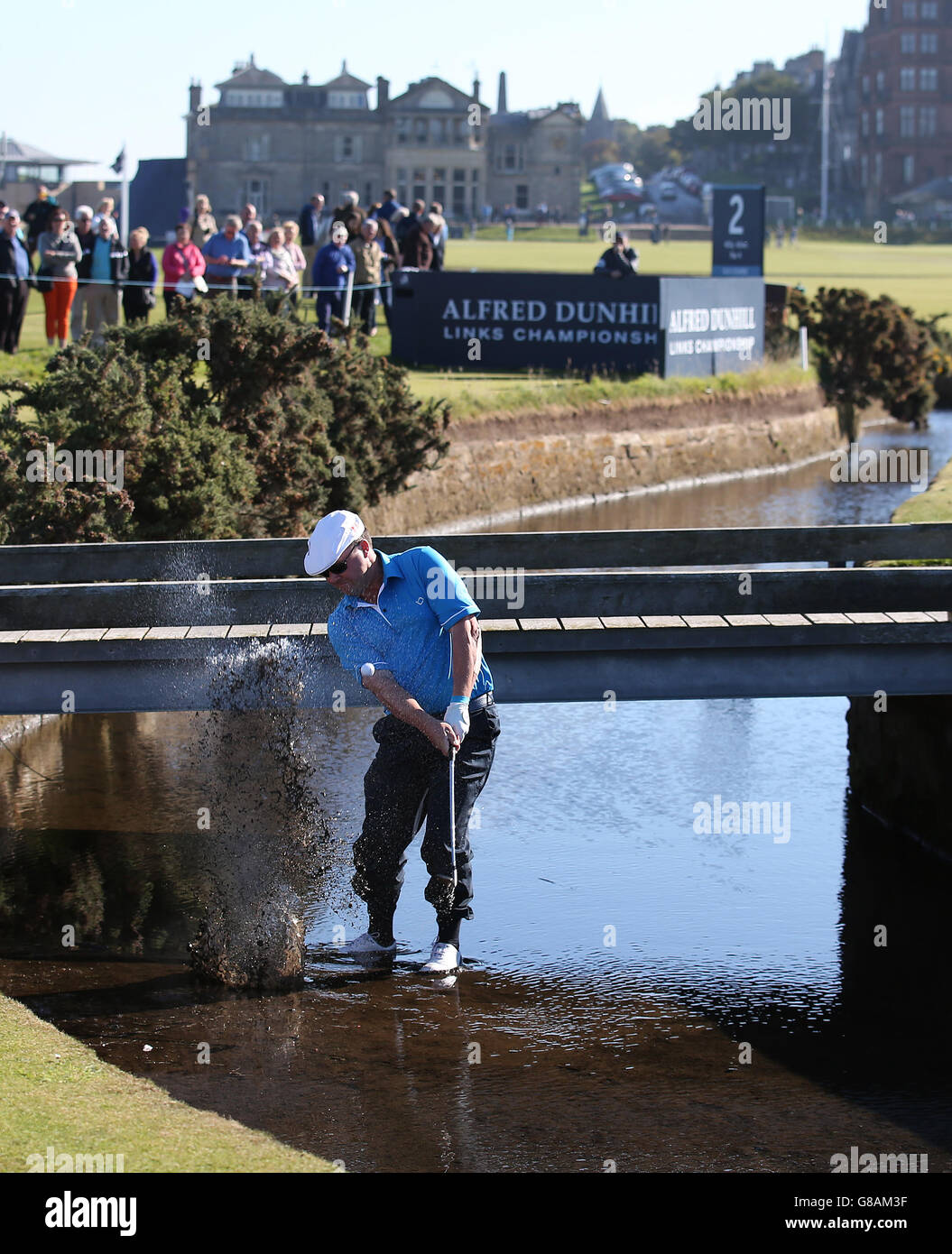 Scotland's Chris Doak plays a shot out of the Swilken Burn during day ...