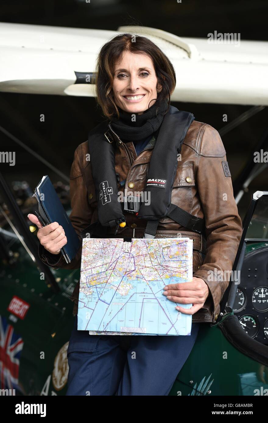Tracey Curtis-Taylor next to her 1942 Boeing Stearman Spirit of Artemis ...